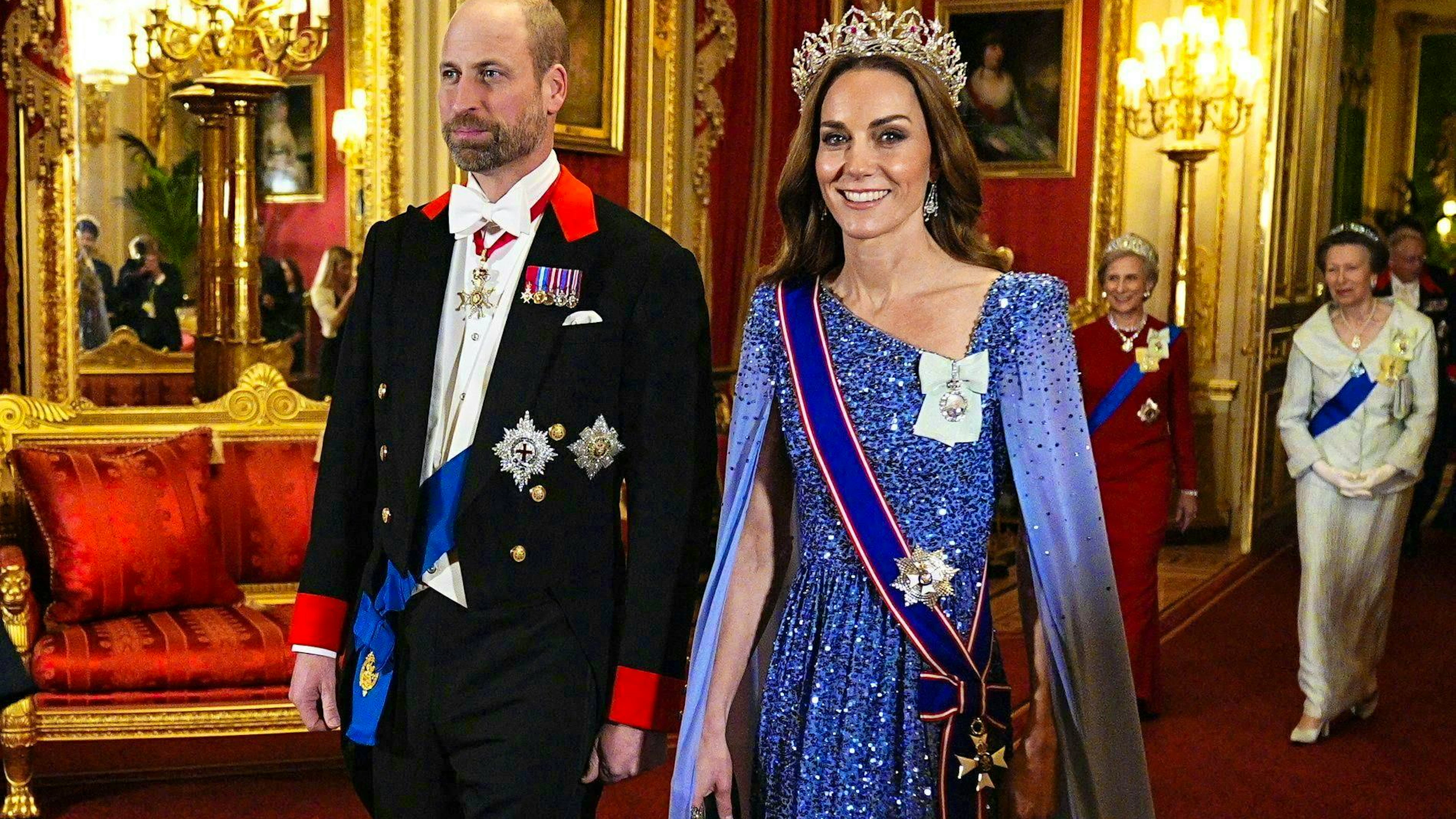 Kate delights at the state dinner - but there's more to her dress